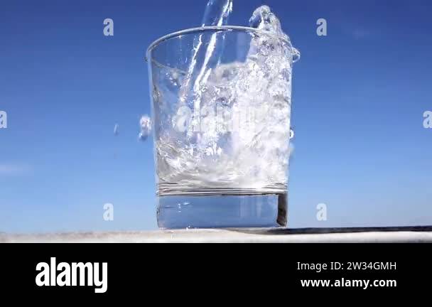 Full glass water in Stock Videos & Footage - HD and 4K Video Clips - Alamy