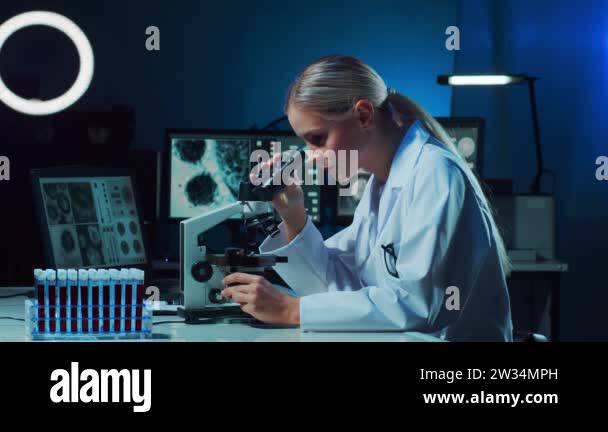 Female scientist working in modern lab. Doctor making microbiology ...