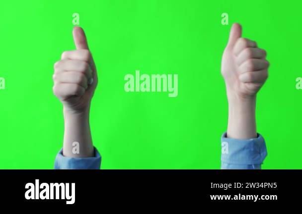 Thumbs up sign hand gesture on green screen. Simbol of approval like ...