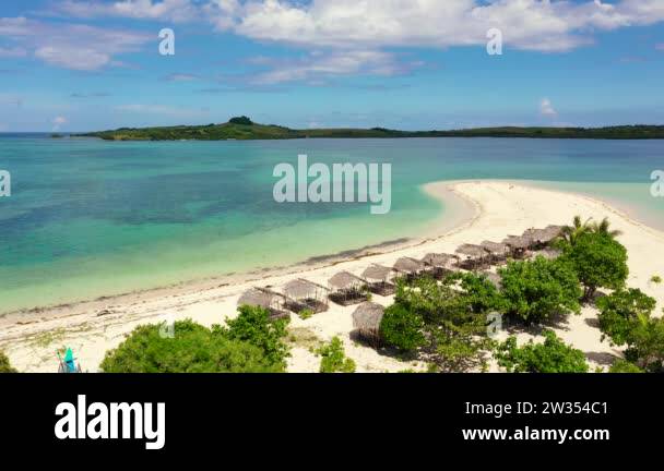 Wild white sand beach with coconut trees. Cotivas Island Cottage ...