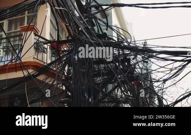 Power lines electric cables in the city streets of Hanoi, Vietnam Stock ...