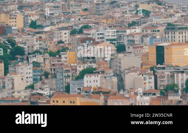 Beautiful red roofs with many satellite dishes and air conditioning ...