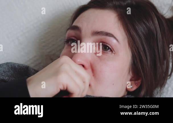 Young woman suffering from depression. The girl experiences sadness, crying, tears Stock Video ...