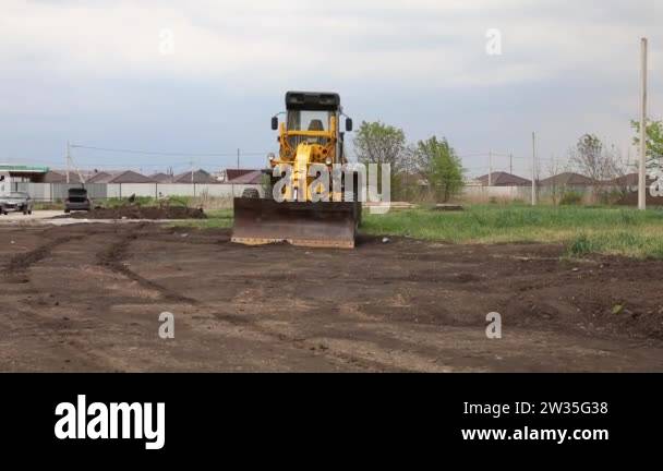 Yellow bulldozer with bucket. Wheel Loader. Yellow Front Loader. Heavy ...