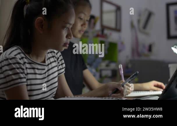 Two school girls writing Stock Videos & Footage - HD and 4K Video Clips ...