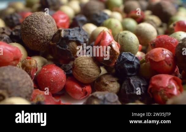 extremely close-up, detailed. mix of five peppers, multi-colored ...