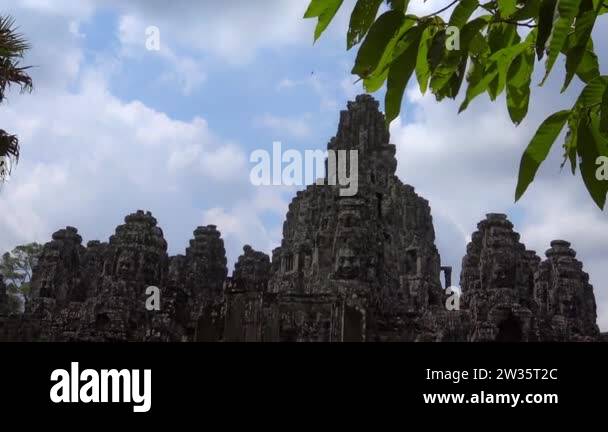 4K, Face towers depicting Bodhisattva Avalokiteshvara. Smiling faces ...