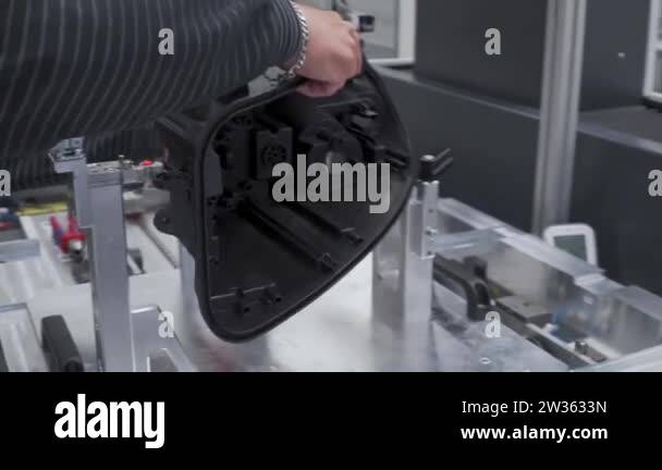 inserting plastic casting on the machine platform for 3D measurement in ...
