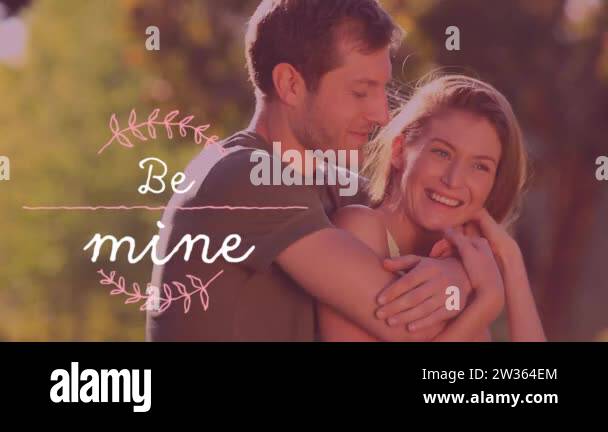 Animation of Be Mine text written in white letters with happy Caucasian ...