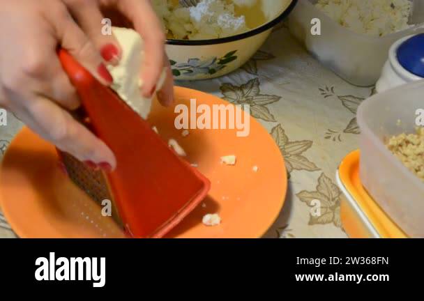 grating cheese.Cooking in kitchen Stock Video Footage - Alamy