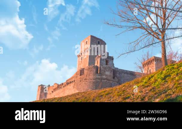 Time lapse of medieval castle up the hill of Assisi, province in Umbria ...