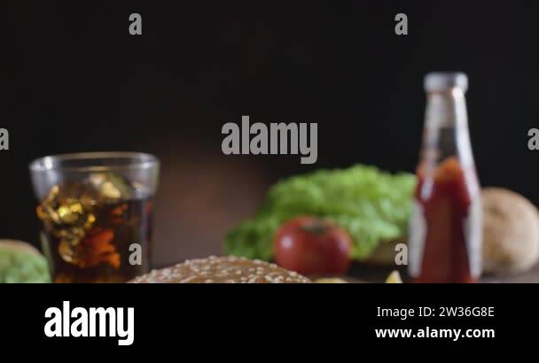 Camera pans slowly across the fast food dining table - sweet carbonated ...