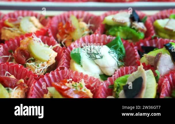Picking finger food, canapes sandwiches at party buffet Stock Video ...