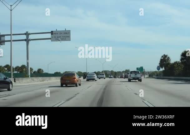 Many cars move on roads Miami. Miami the second-large city in Florida ...