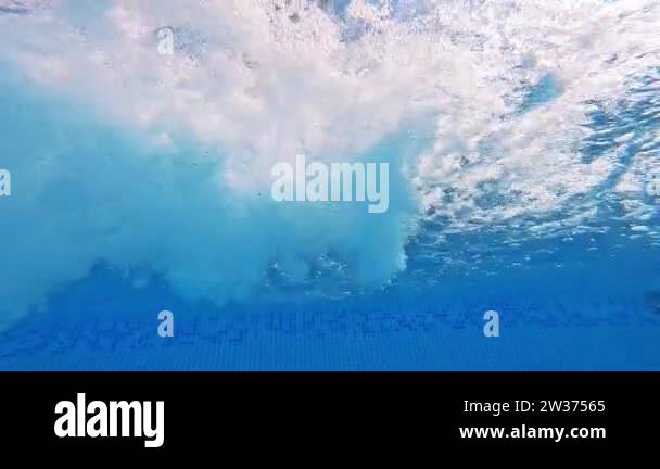 Bubbles inside the swimming pool. Beautiful underwater view of a pool ...