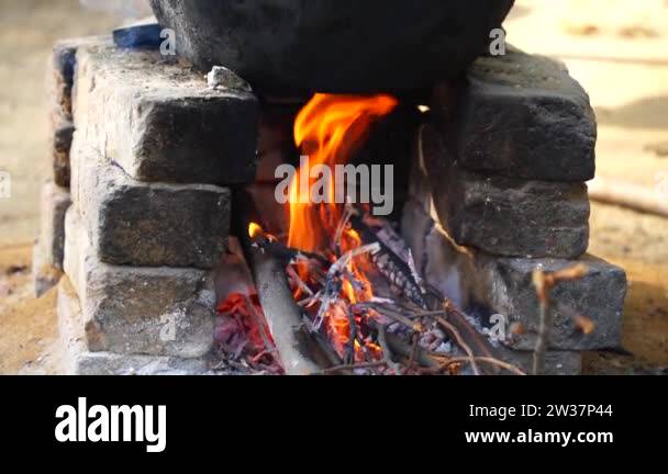 Traditional stove footage with illuminating fire. Natural fire for ...