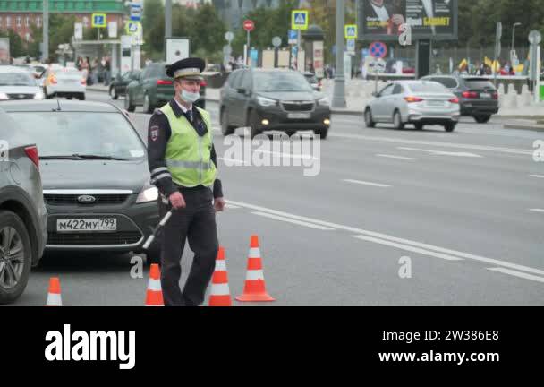 Traffic police officer works on major street in a big city Stock Video ...