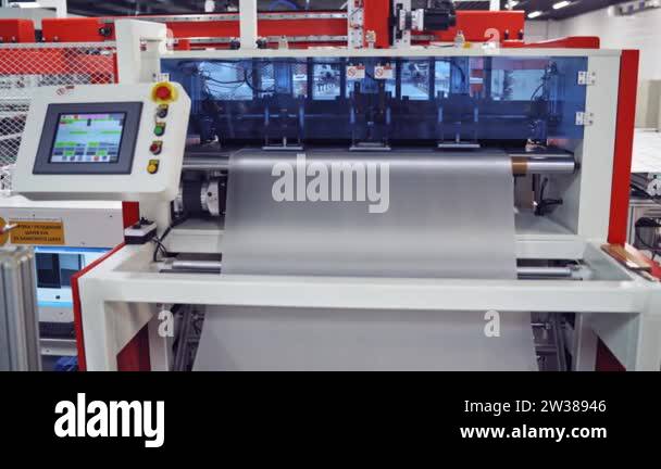 Closeup of special machinery at solar production panels factory ...