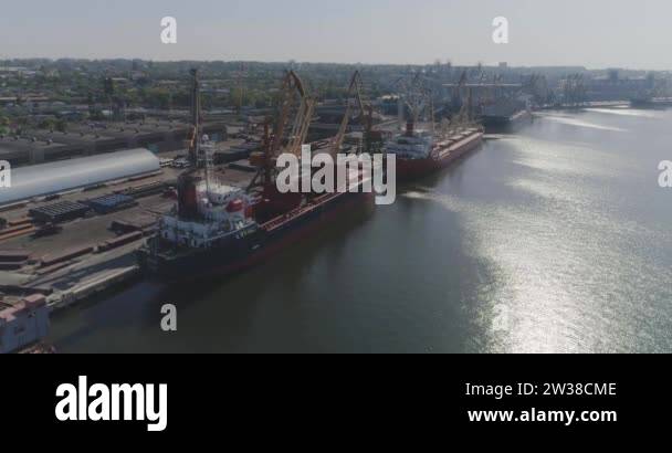 The general plan of a large seaport, Flight over the port with cargo ...