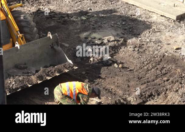 Europe, Kiev, Ukraine - May 2020: An excavator tractor loads old ...