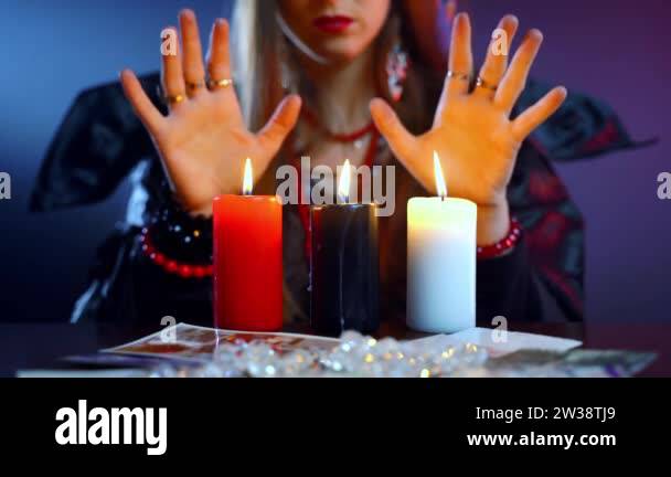 Black ritual performance in dark room with candles and people photos ...