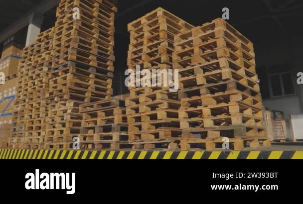 Wooden pallets in a beautiful warehouse. Pallets in a warehouse Stock ...