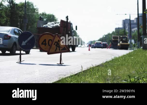 Road signs indicating repair of the road standing on the roadway Stock ...