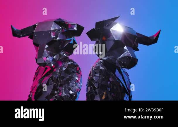 Two people in creative costumes of bulls from the mirrors posing and ...