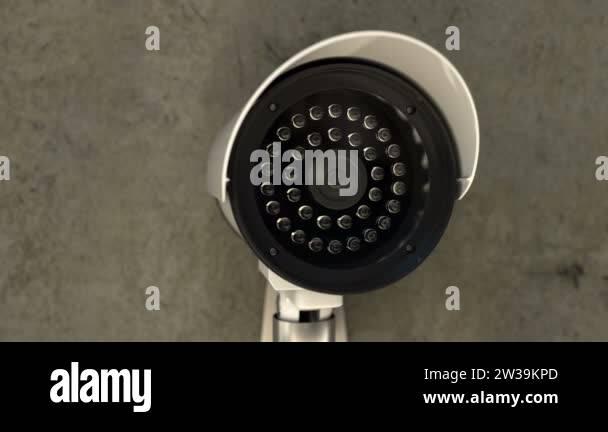 Security CCTV camera rotates and scanning area for surveillance ...
