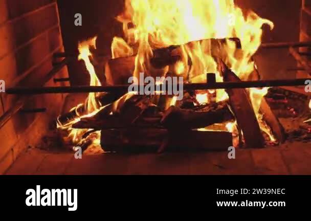 Close-up photo of bright burning fire at the bottom of shot. Flame ...
