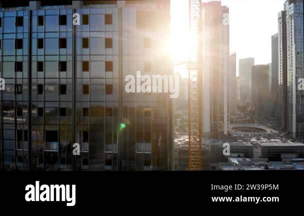 Workers are Building High-rise and Installing the Precast Glass Panel ...