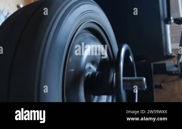 Mechanic worker makes computer wheel balancing on special equipment ...