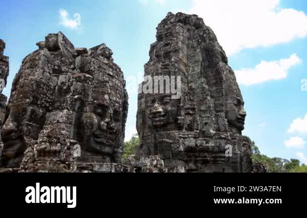 4K, Face towers depicting Bodhisattva Avalokiteshvara. Smiling faces ...