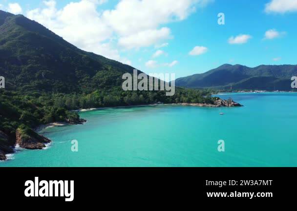 Bright turquoise water edging mountains. Summer scenery on Thailand ...
