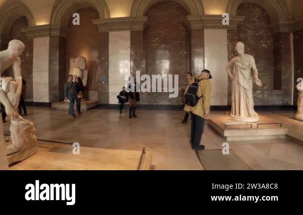 Statues and sculptures in the Louvre museum in Paris. France. Video in ...