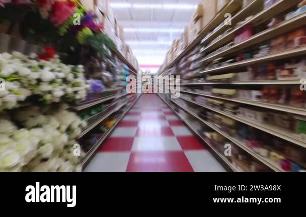 At the supermarket store pov action camera motion, through row section ...