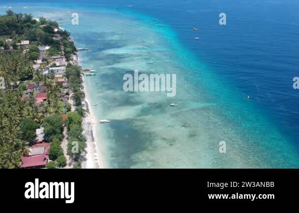 drop down drone over the shelf of a tropical island gili islands Stock ...