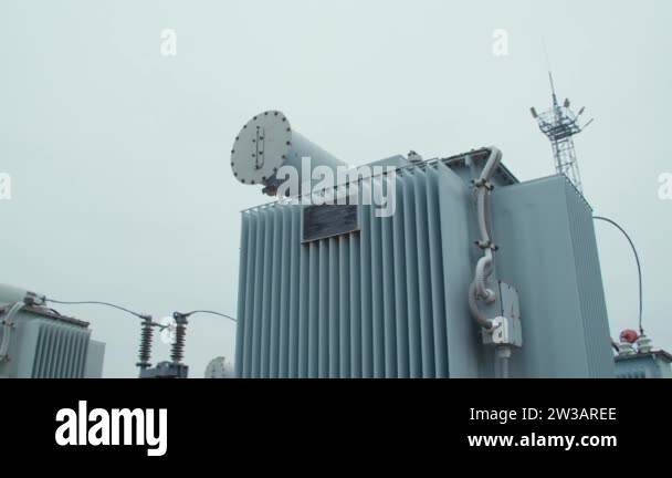 High voltage substation 110 kV with tall pylons and hog voltage ...