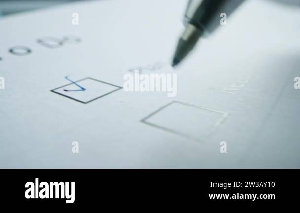 Person Ticks Checkbox Marks with a Pen, filling up To Do List. Checking ...