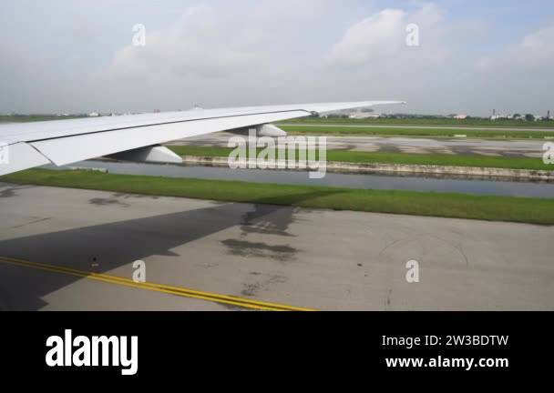Close-up Airplane Wing Over the Runway, the Plane Is Ready for Take off ...