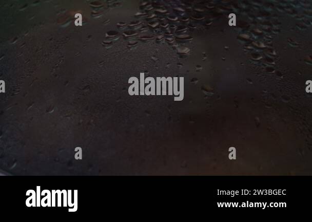 Drops of water and steam drip down the glass lid of the pan as you cook ...