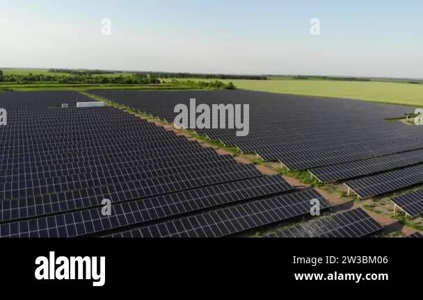 Big power plant with blue solar panels. View from drone. Blue panels ...