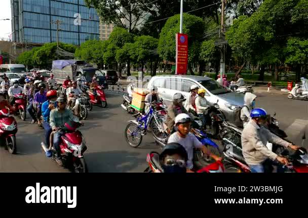 Ho Chi Minh City - City traffic on junction with traffic lights. 4K ...