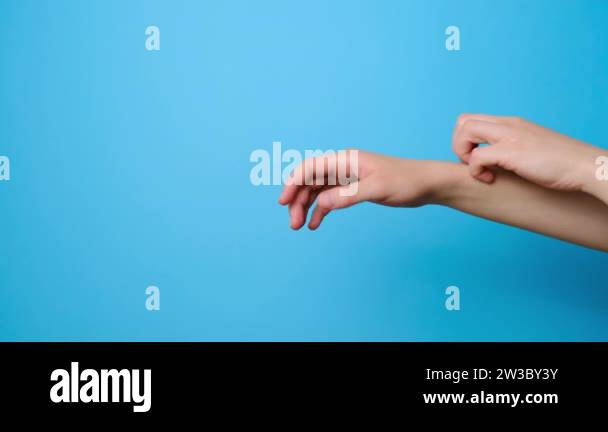 Close up of unrecognizable young woman scratches her hands isolated on ...