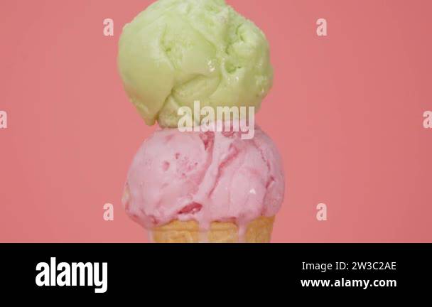 Time lapse, Melting of shetbet and strawberry ice cream on the cone ...