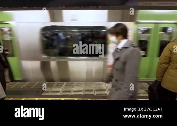 Tokyo, Japan-04 February, 2017: 4K, Japanese people on platform railway ...