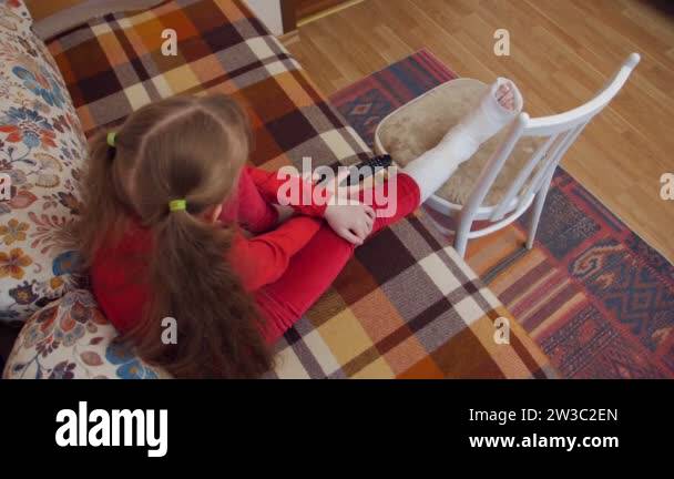 Girl watching tv Stock Videos & Footage - HD and 4K Video Clips - Alamy