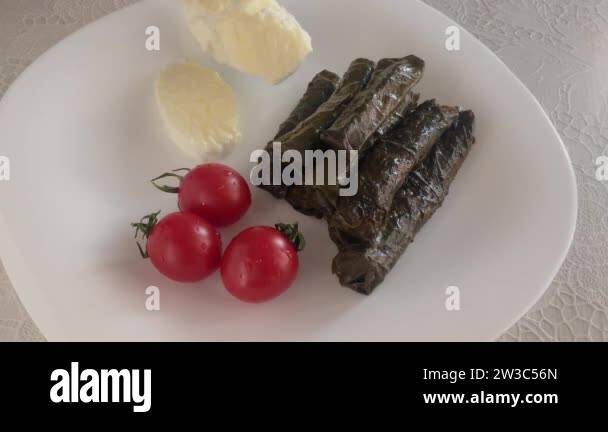Yaprak sarma, Turkish traditional food, stuffed vine leaves, yogurt and ...