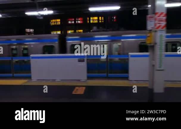 Tokyo, Japan-02 February, 2020: 4K Train travels over railroad through ...