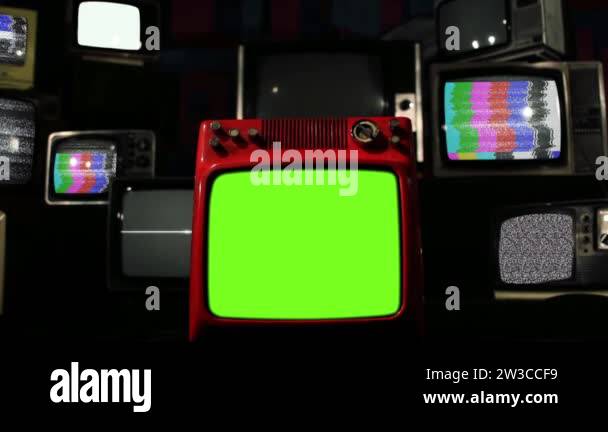 A Red Retro TV with Green Screen among Many Retro TVs with Color Bars ...